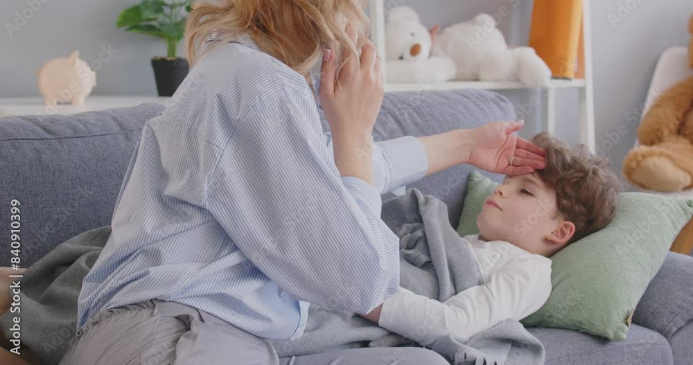 Caring mother calls family doctor or pediatrician when her child falls ...