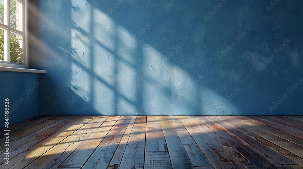 Blue empty wall and wooden floor with interesting with shadow from the ...
