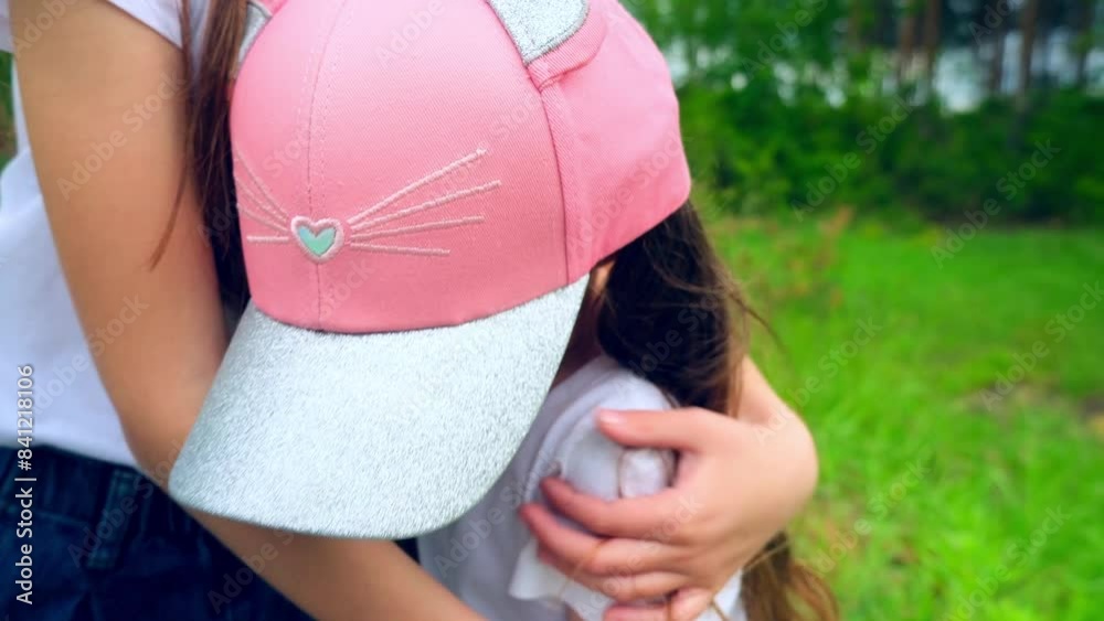 Happy family: little kid girl hugs circling embraces sister hold hand ...