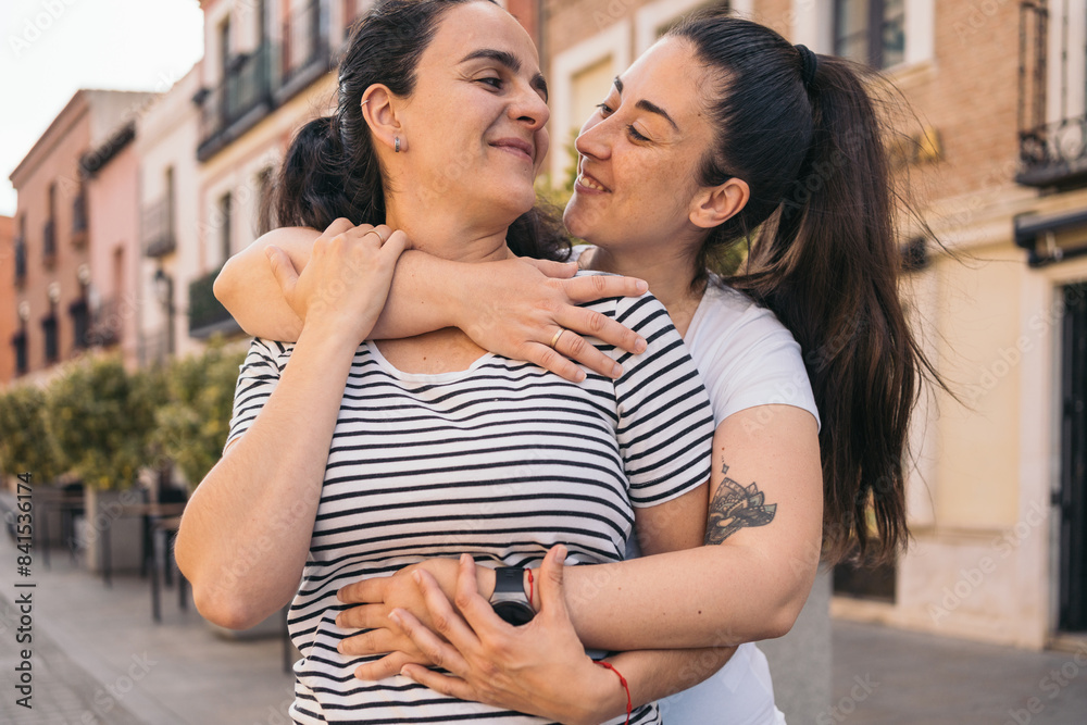 Loving lgbtq couple embracing in urban setting. Affectionate lgbtq ...