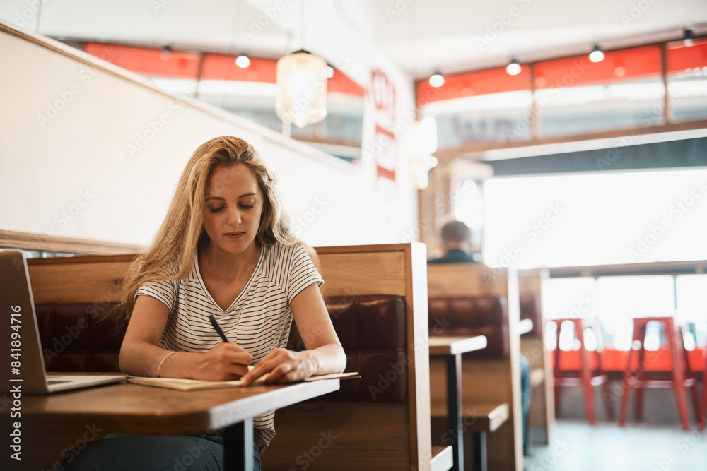 Woman, notebook and writing at coffee shop with laptop as university ...