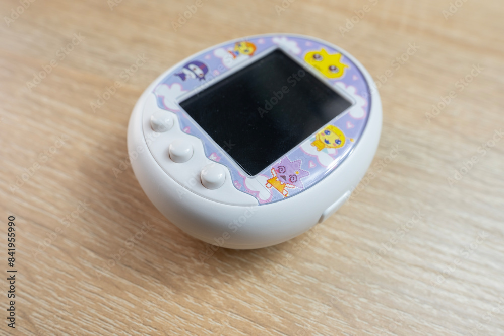 Tamagotchi digital pet with its charming pixelated design, virtual ...