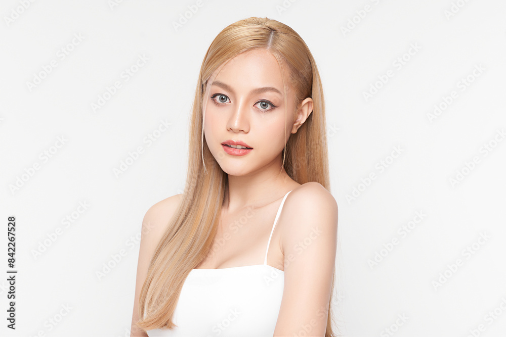 Beautiful young asian woman with clean fresh skin on white background ...