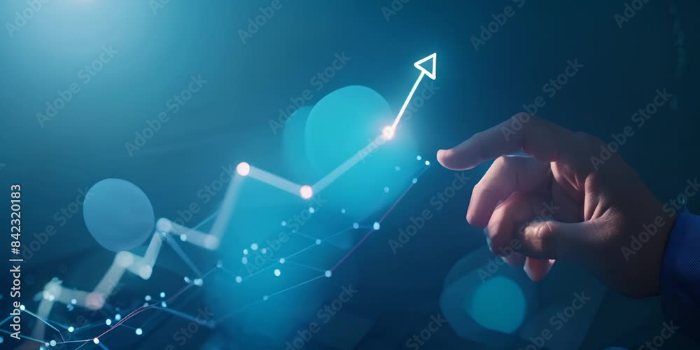 Businessman touching a glowing graph line that goes upward on a ...