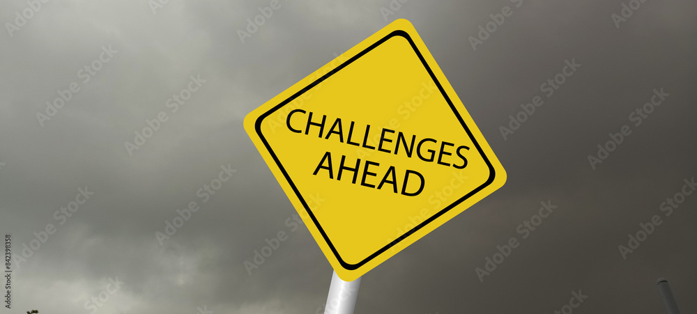 Challenges ahead sign. Black on yellow diamond background. Road safety ...