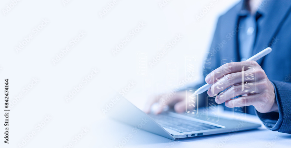 manages document data on a laptop, business paperless. ERP, enterprise ...