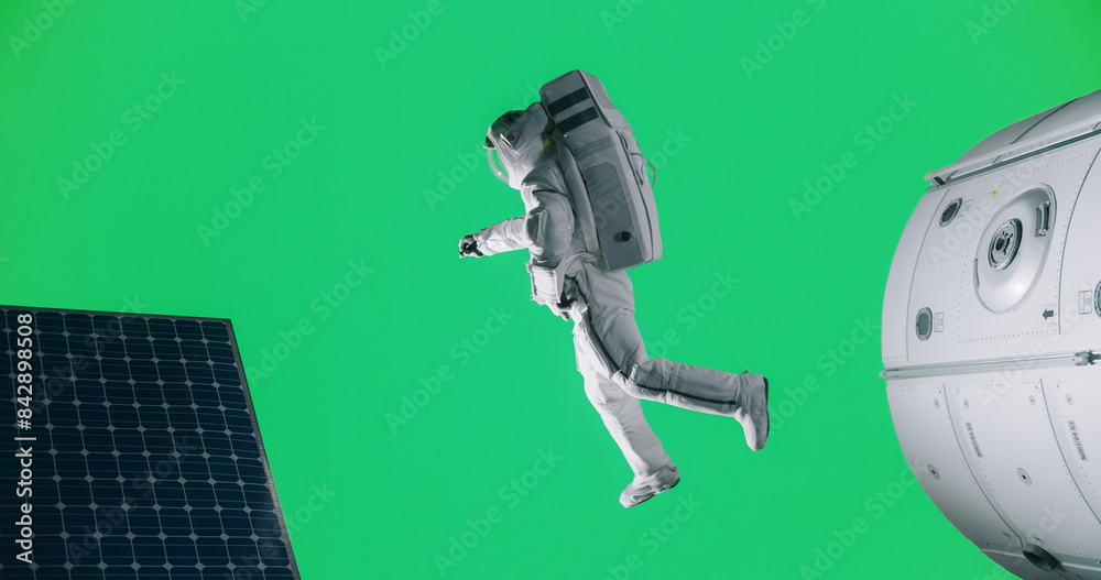 Green Screen Chroma Key Studio Production: Male Astronaut in a Costume ...
