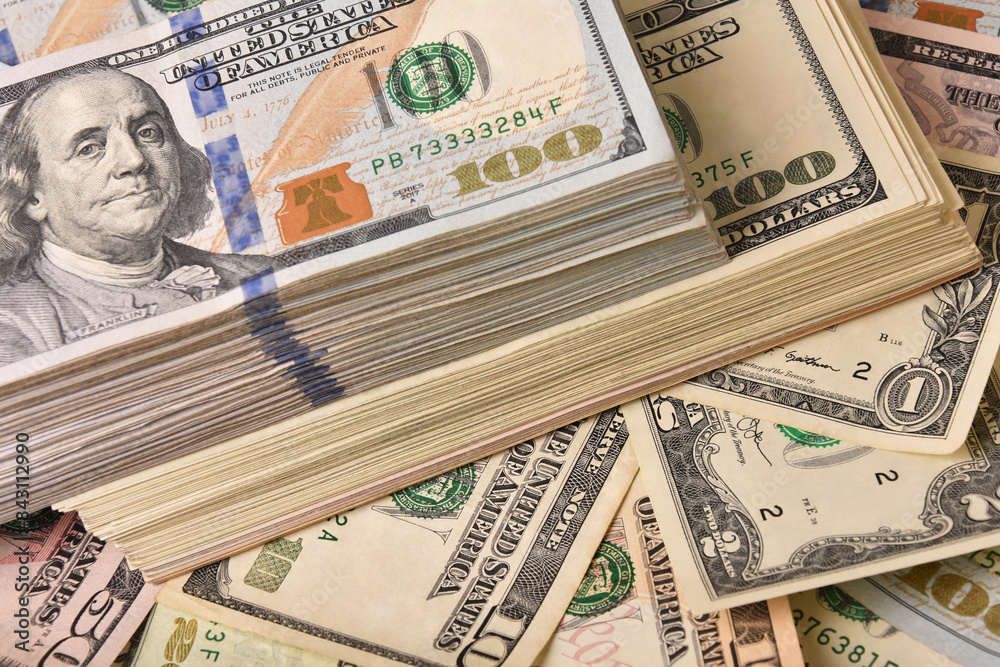 Paper money lot of dollar banknotes ภาพถ่ายสต็อก | Adobe Stock
