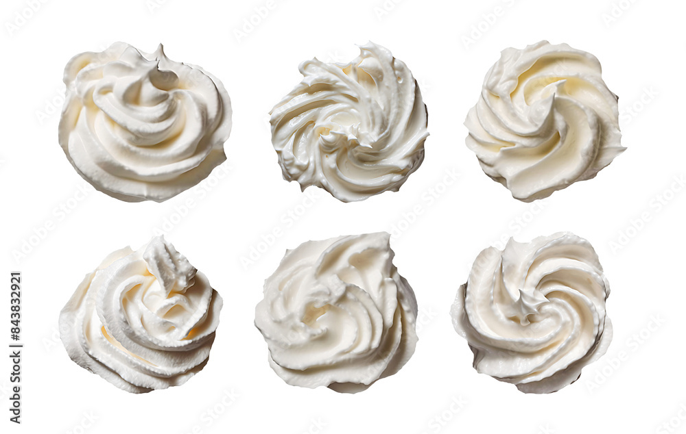 Whipped cream, six dollops in various sizes and shapes, isolated on a ...