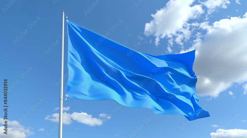 A blue flag is waving in the wind. The flag is made of a light blue ...