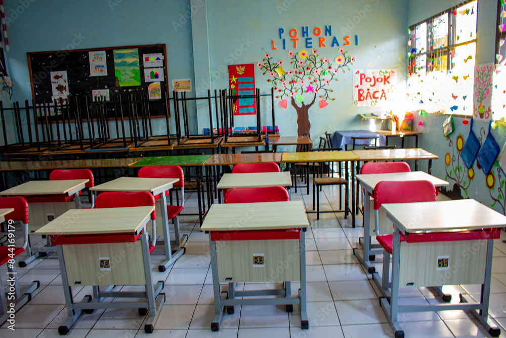 Empty class room of elementary school, Desks, chairs and white board in ...