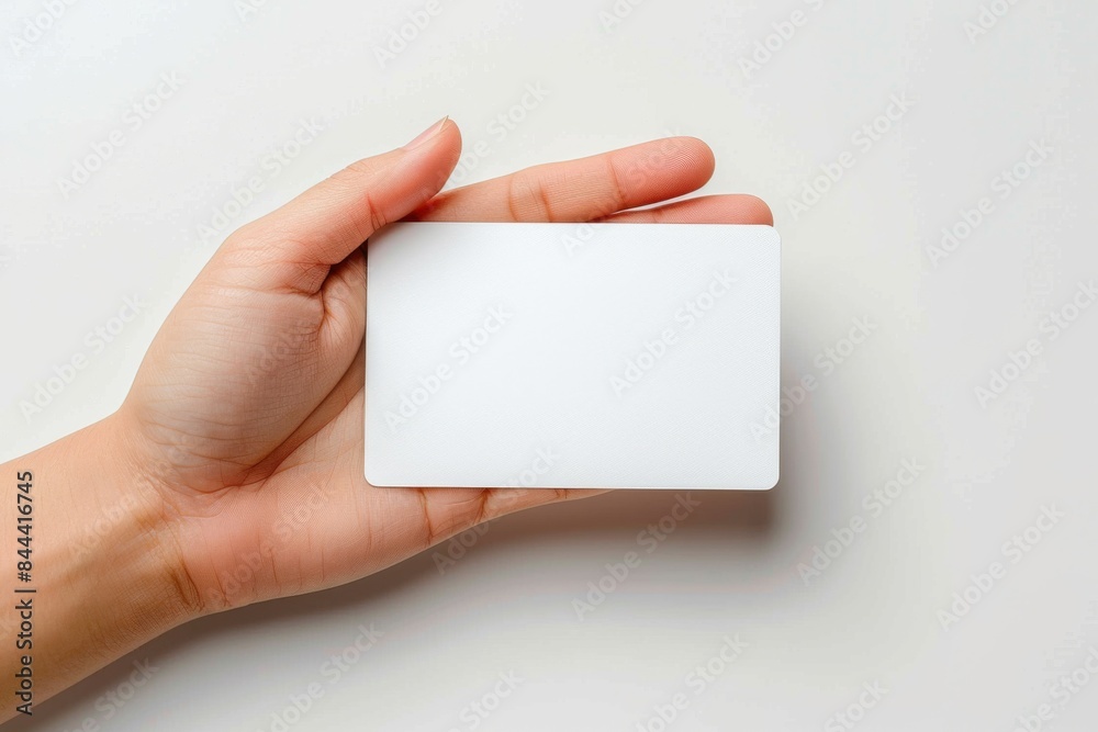 Blank White Card Mockup on Hand created with Generative AI Stock Photo ...