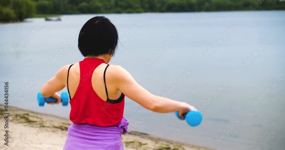 Caucasian woman with perfect shape while exercising outdoors. Exercise ...