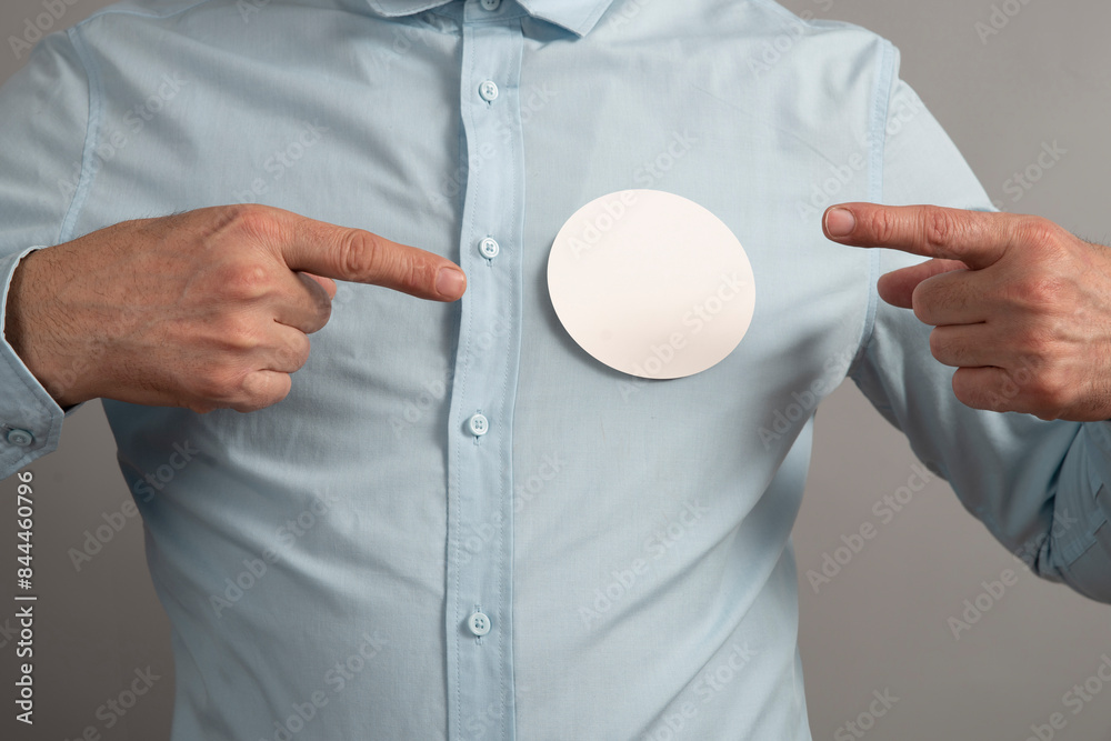 Round badge sticky label mockup template. Fingers pointing to pin ...