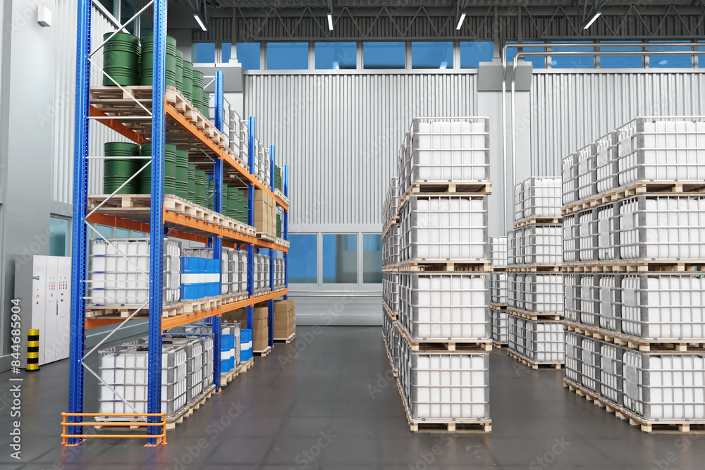Storage of chemical liquids. Factory warehouse. Storage with tanks for ...