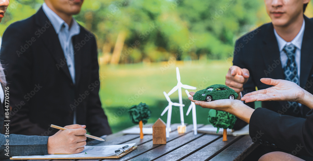 Group of asian business people presenting environmentally friendly ...