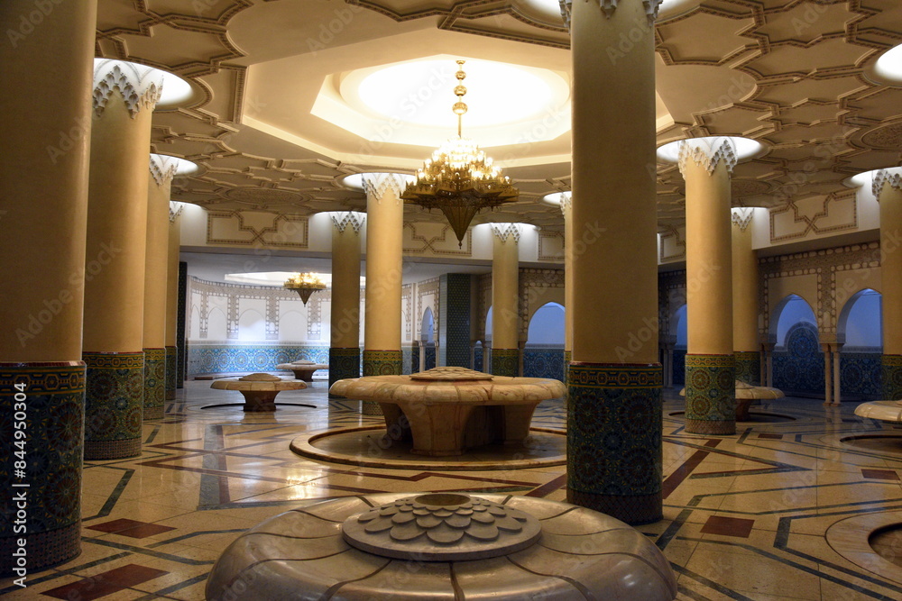 An ablution hall, 45 marble fountains depicting lotus flowers and a ...