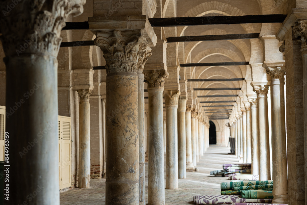 Corridor gallery around inner courtyard of Great Mosque of Kairouan in ...
