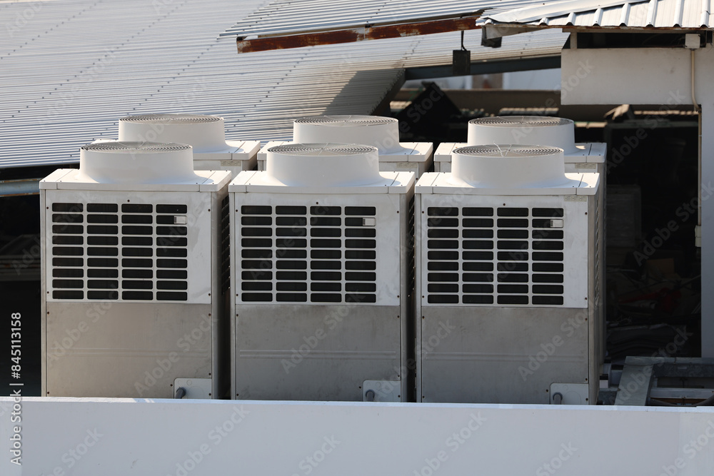 Air conditioner compressor installed in old building. Outdoor split ...