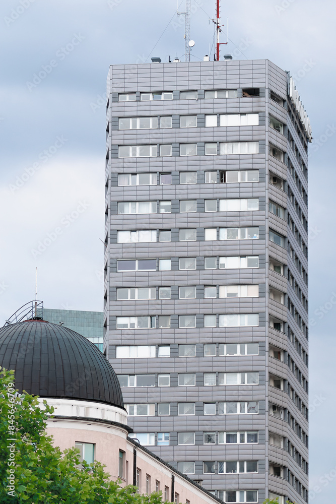 City, a modern high-rise apartment building, the facade of a gray ...