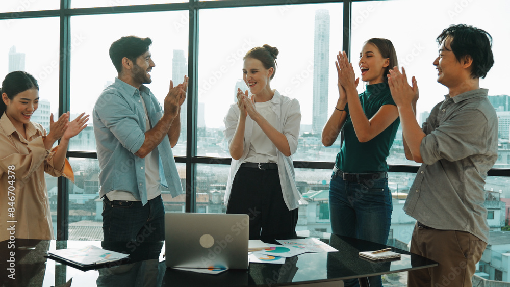 Professional business team clapping hand together with document scatter ...