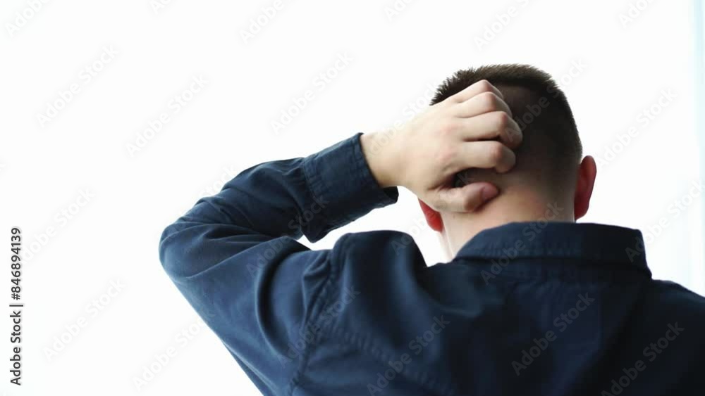 the man scratches the back of his head. Hands scratching head. Scalp ...