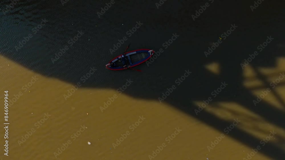 Traditional rowing boat crosses the riachuelo from Isla Maciel to La ...