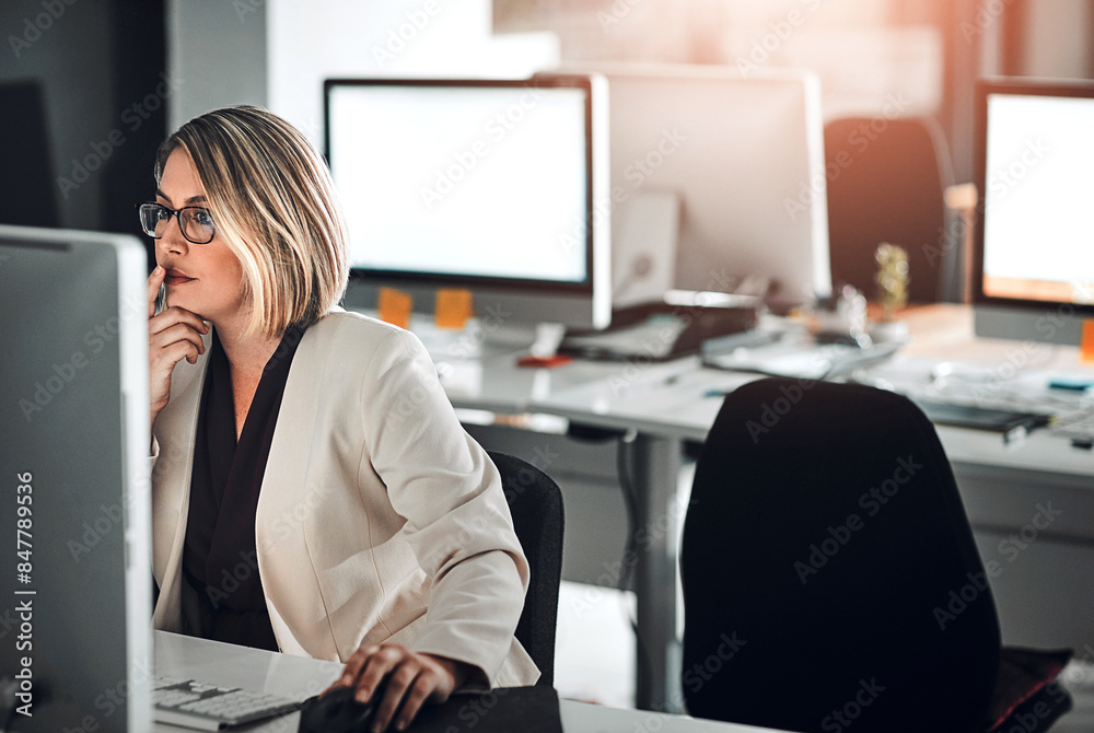 Computer, thinking and business woman in office for planning, research ...