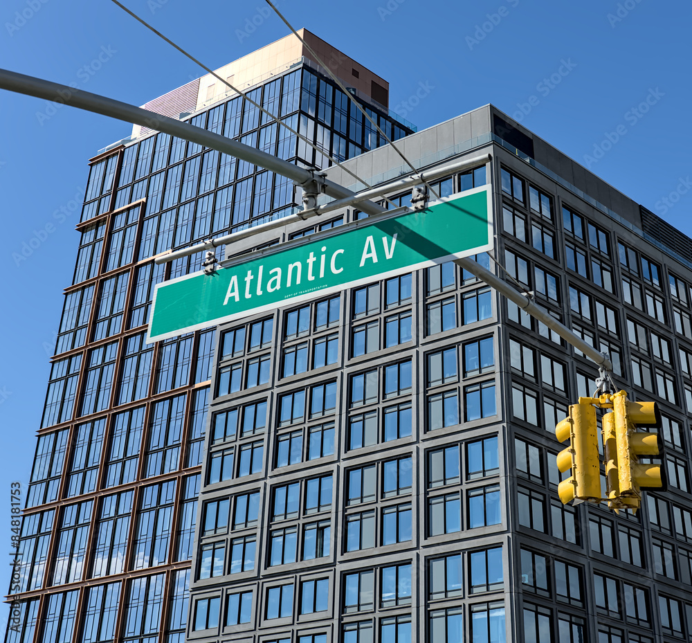 Atlantic avenue sign on street light traffic light lamp post in ...