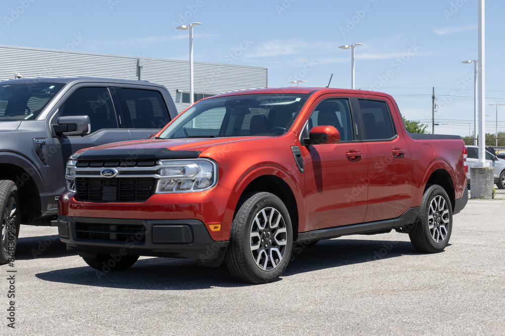 Ford Maverick Lariat Hybrid display at a dealership. Ford offers the ...
