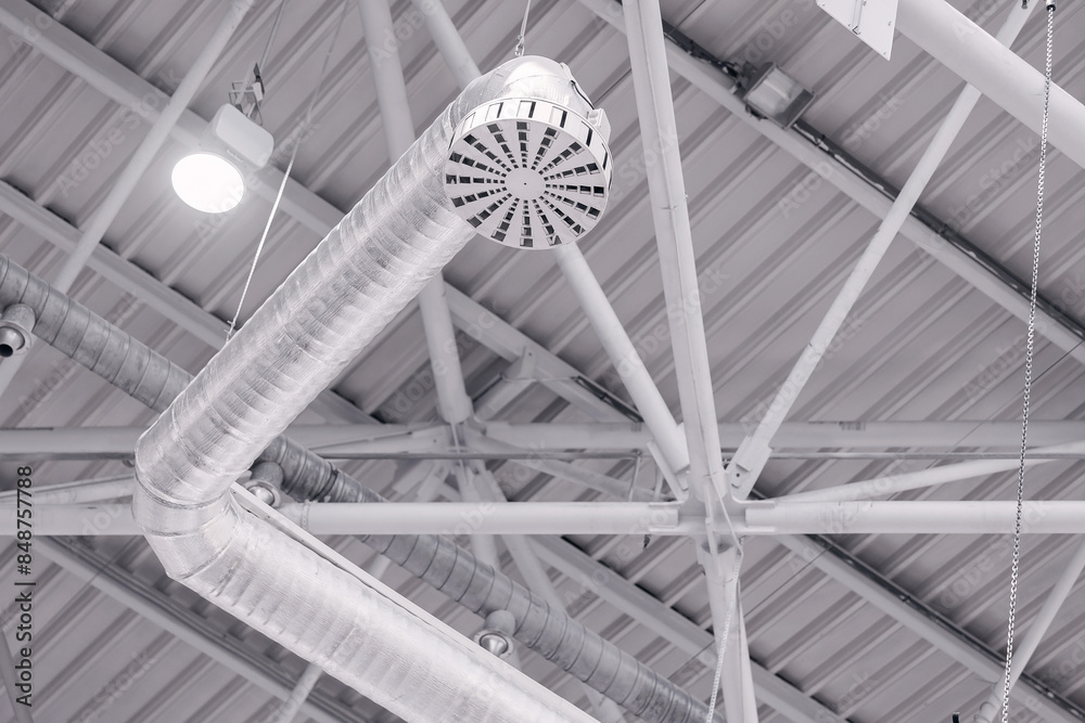 Ventilation system in shopping mall, pipes hvac duct tube hanging from ...