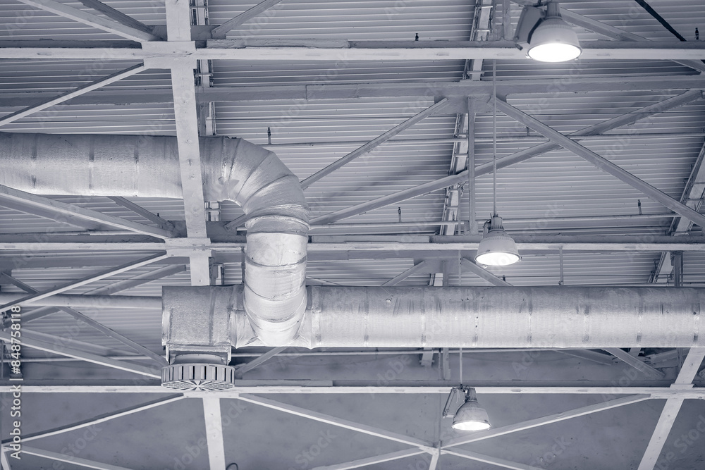 Ventilation system in shopping mall, pipes hvac duct tube hanging from ...