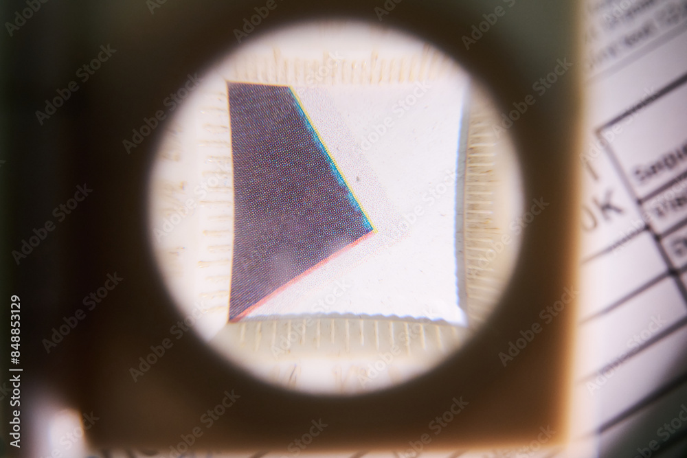 A close up detail magnifying glass showing the dot matrix printing ...