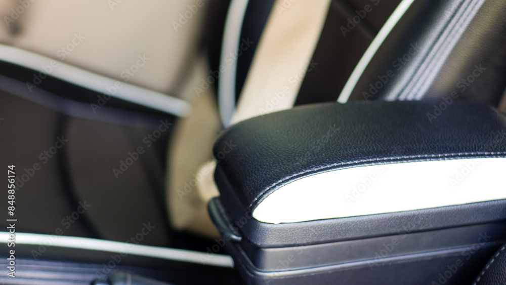 Black and white small leather arm rest, moves and opens in the interior ...