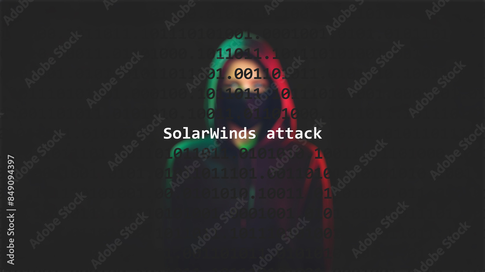 Cyber attack solarwinds attack text in foreground screen, anonymous hacker hidden with hoodie in ...