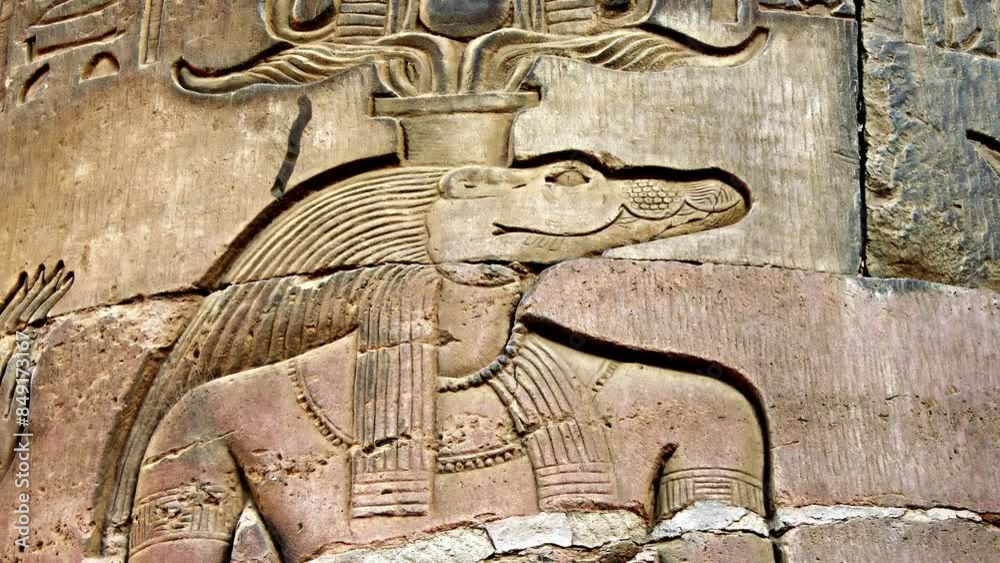 Crocodile head depicting an ancient Egyptian mythological god carved on ...