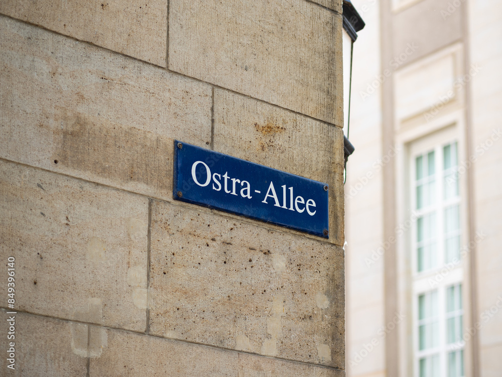 Ostra-Allee road name sign in Dresden, Germany. Street signage on a ...