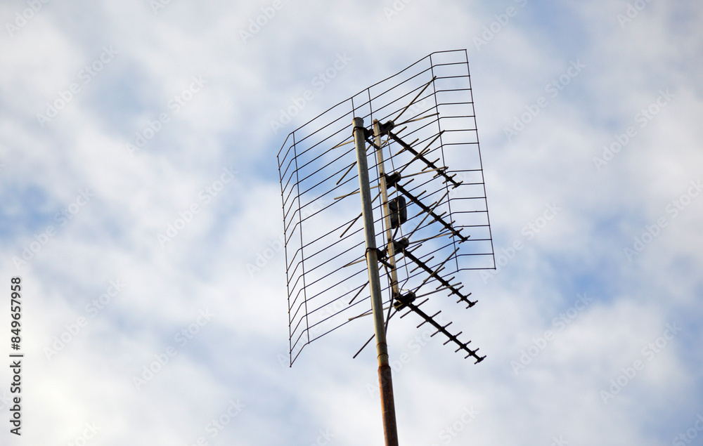 antenna for television against the background of the sky with clouds ...