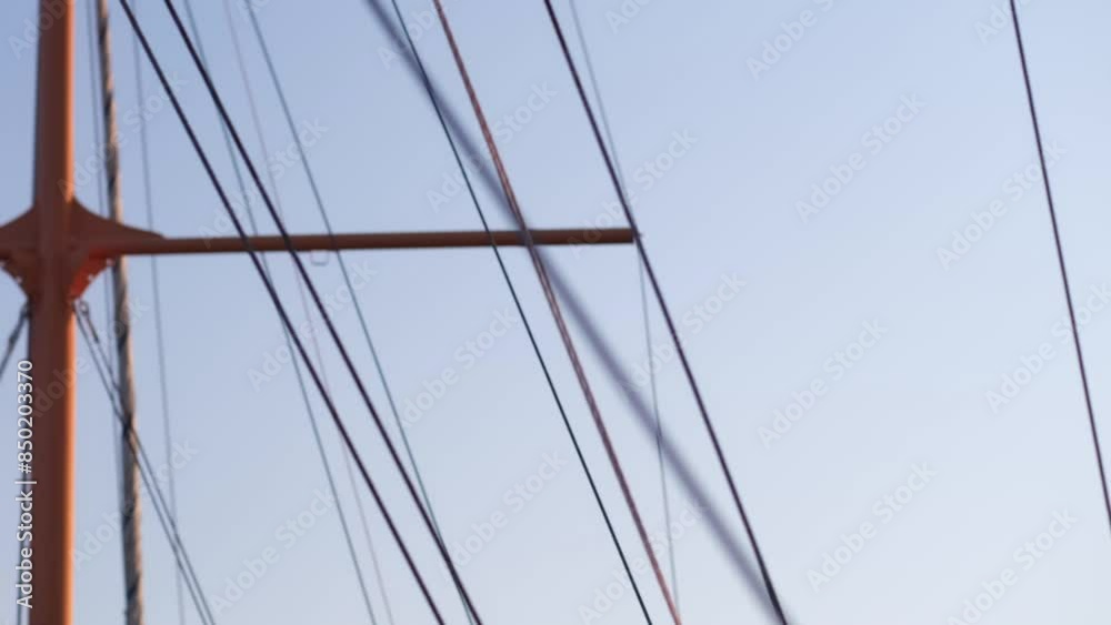 Yacht mast in parking in port. boat top of their masts against sunset ...