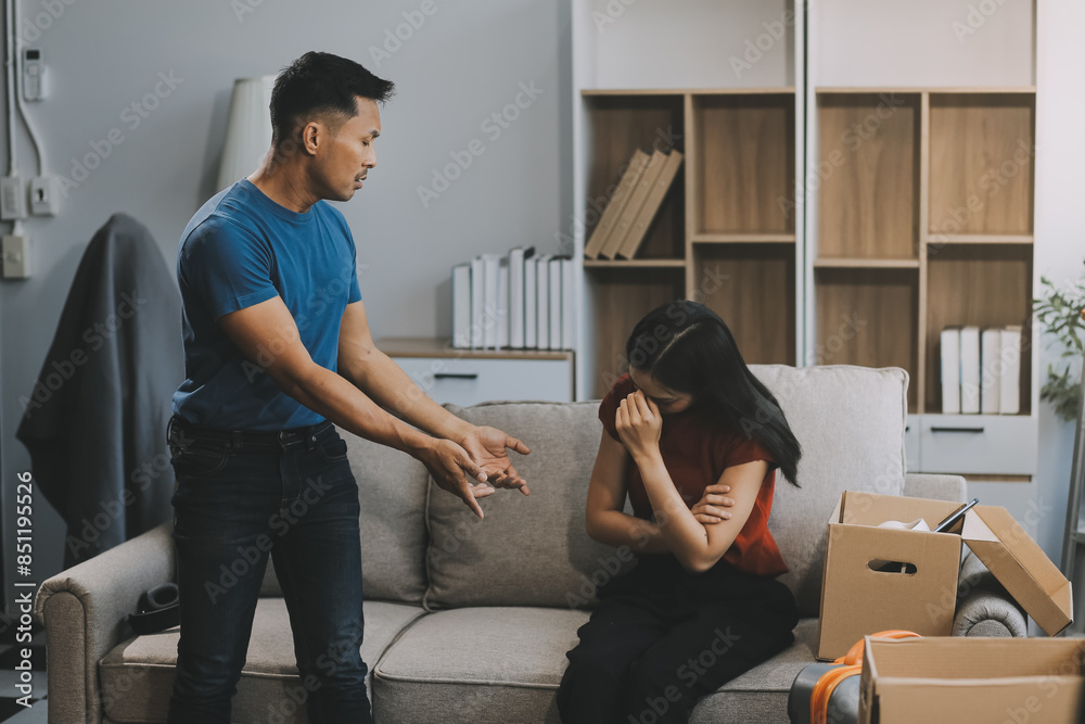 Family couple ignoring each other after a quarrel. Two people turn away ...