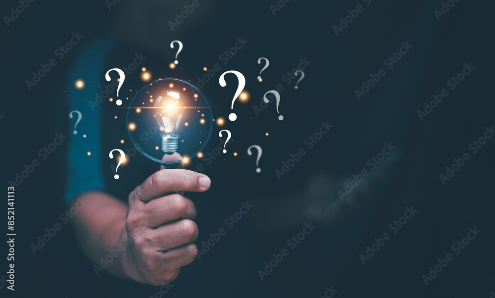 Foto de Critical thinking and analysis concept. Businessman holding ...