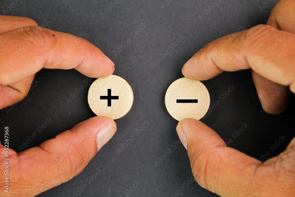 positive and negative symbols. plus and minus signs. The concept of ...