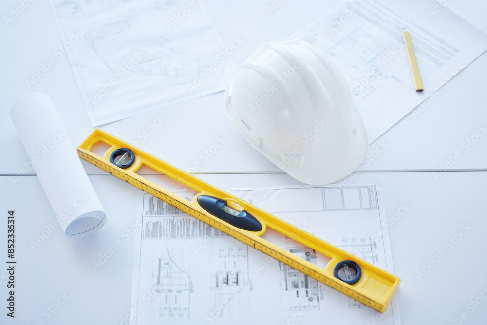 Architecture, level and above of desk with blueprint, floorplan and ...