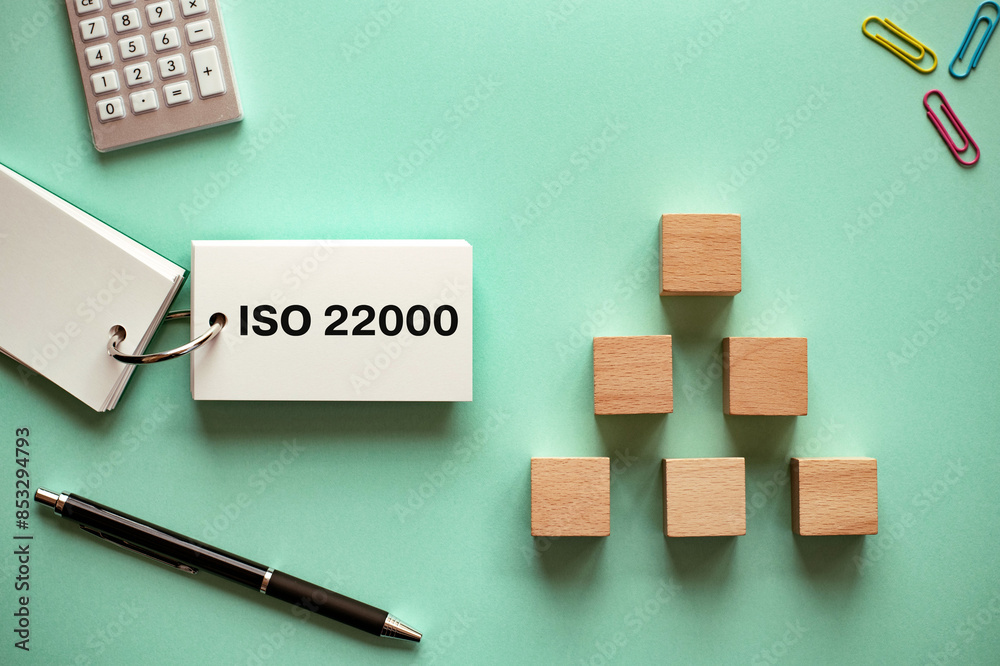 There is word card with the word ISO 22000. It is as an eye-catching ...