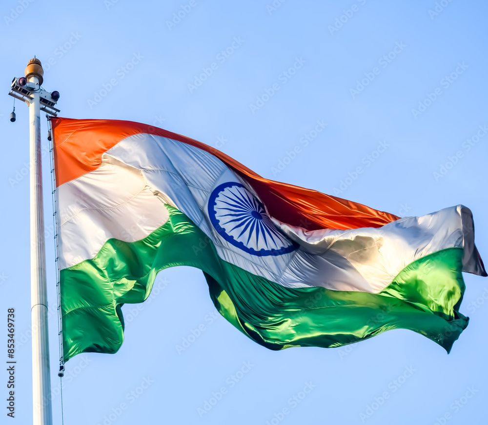 India flag flying high at Connaught Place with pride in blue sky, India ...
