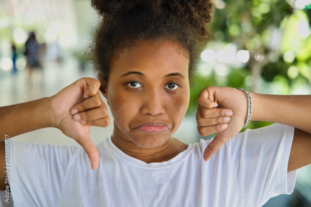 Upset African black Woman Expressing Disagreement with double two thumbs down hand Gesture ...