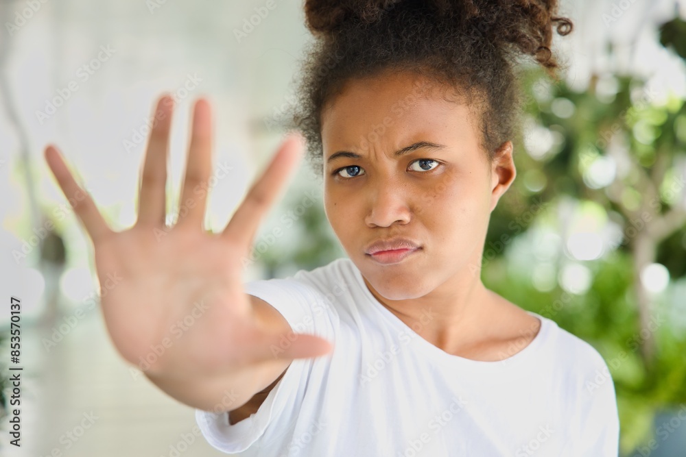 Halt, Stop it, young African black Woman Expressing Refusal, showing Stop Hand Sign to ...
