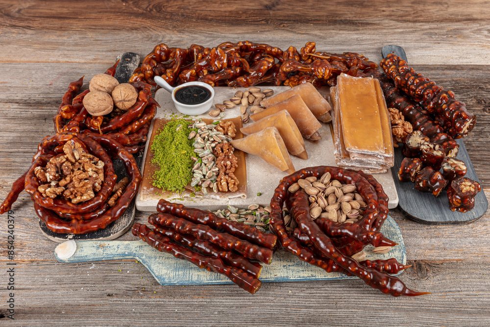 Turkish cuisine various snacks. Walnut sausage, pistachio sausage and ...