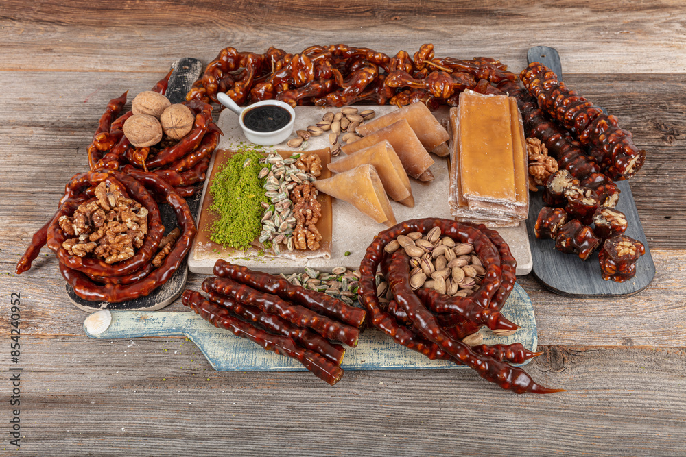 Turkish cuisine various snacks. Walnut sausage, pistachio sausage and ...