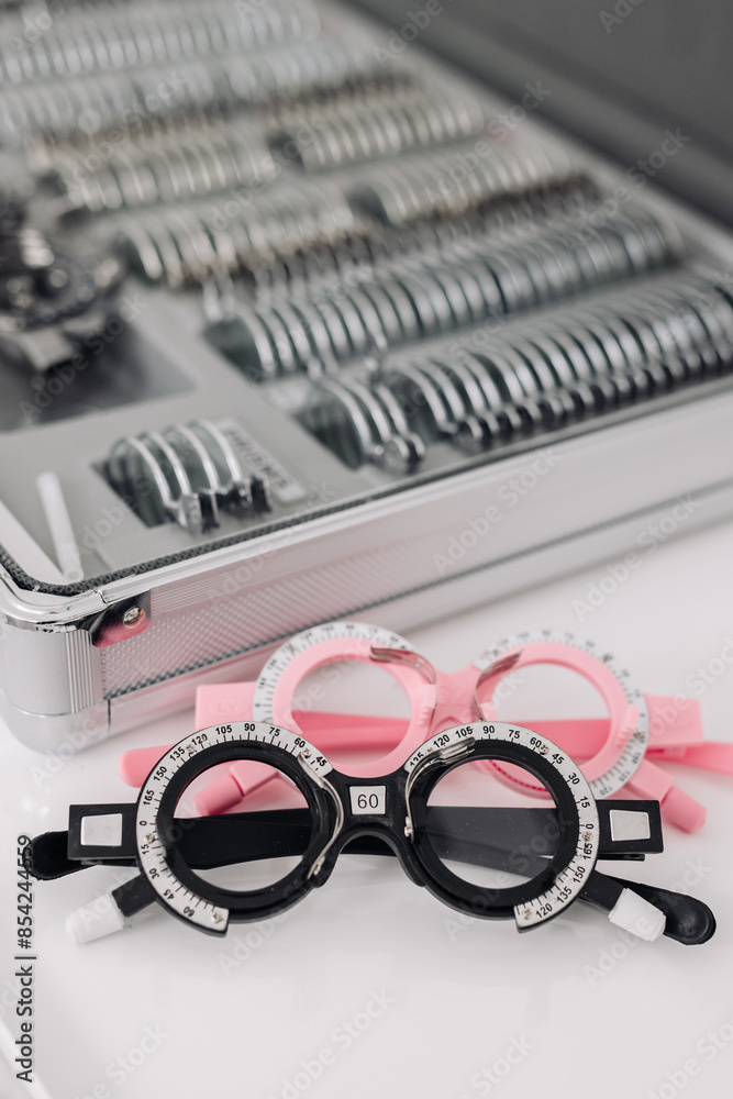 Test frame isolated at the ophthalmologist's workplace in a modern ...